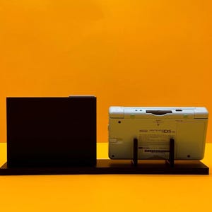 Nintendo DS DS Lite Console and Game Stand Black and White Storage ...