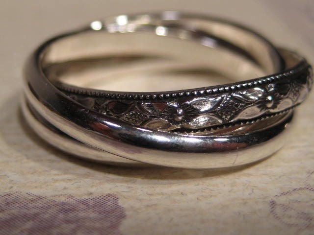 Antique and Plain Band .... Rolling Ring ... Sterling Silver ... Cool ...
