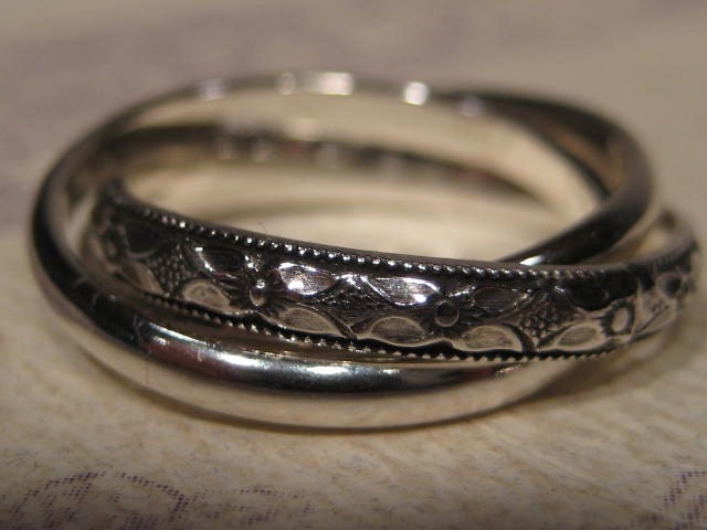 Antique and Plain Band .... Rolling Ring ... Sterling Silver ... Cool ...