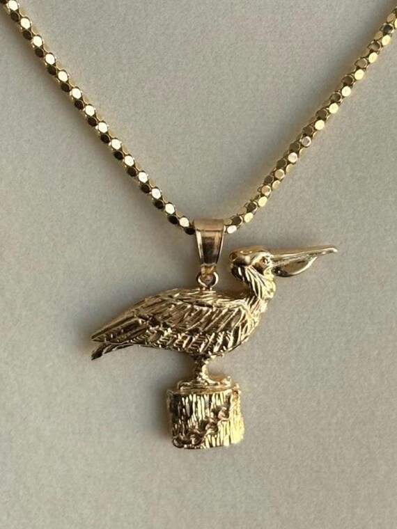 14 Karat Gold handmade Pelican pendant - Gem