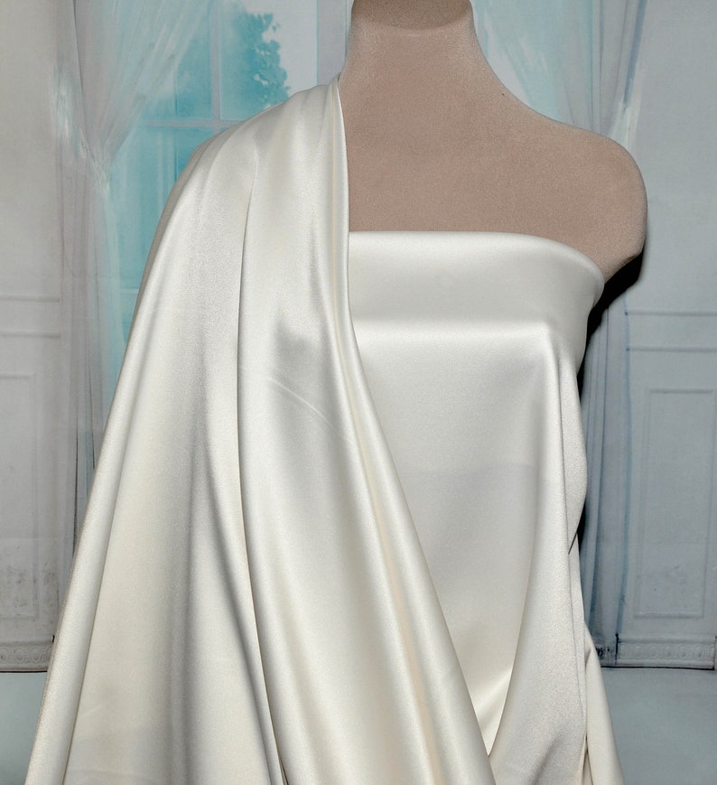 Stretch Peau De Soie Ivory Fabric By The Yard Bridal Etsy stretch-peau-de-soie-ivory-fabric-by-the-yard-bridal-etsy