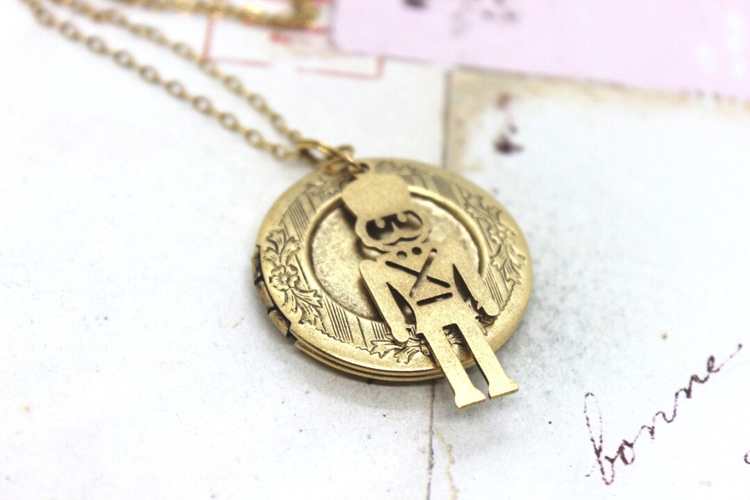Nutcracker. Round Locket Necklace. in Gold Ox With Floral Locket ...