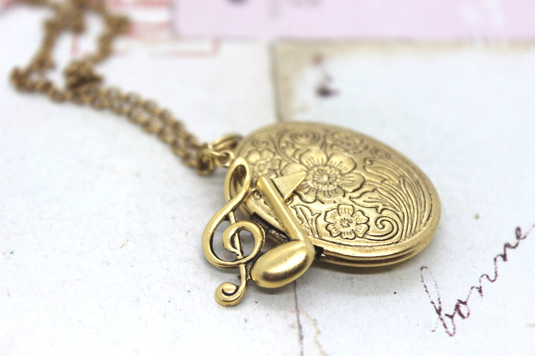 Music Notes Oval. Locket Necklace. Gold Ox Jewelry With Floral Pattern ...