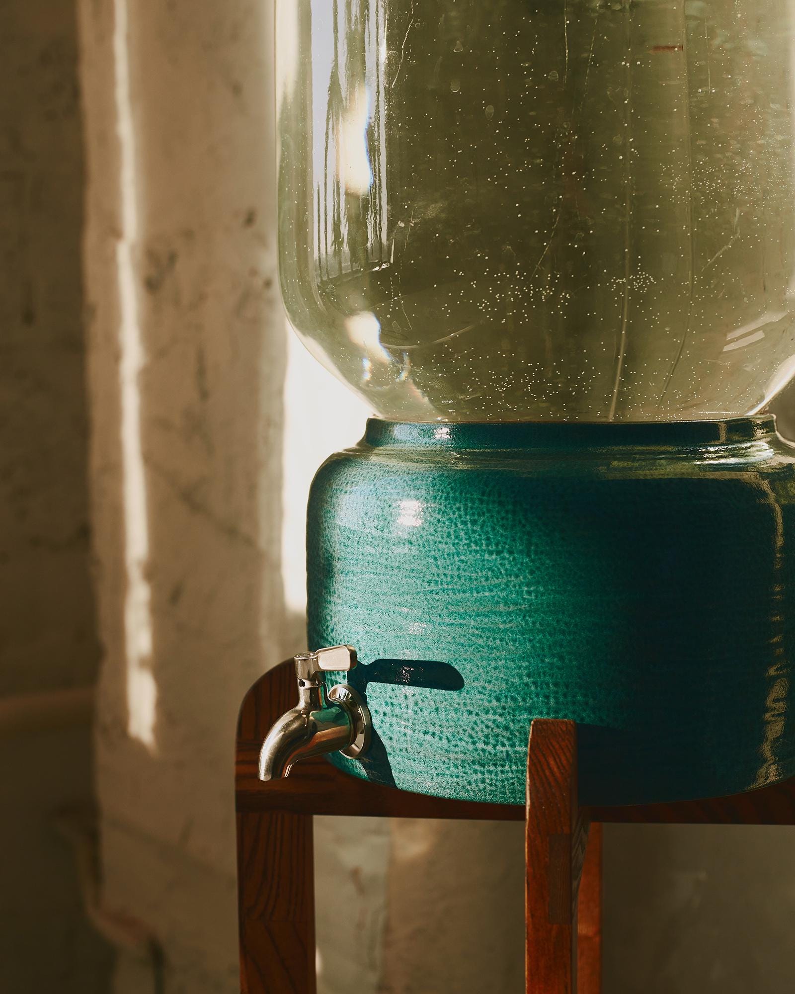 5 Gallon Bottle Ceramic Water Gravity Dispenser on Wooden Plinth ...