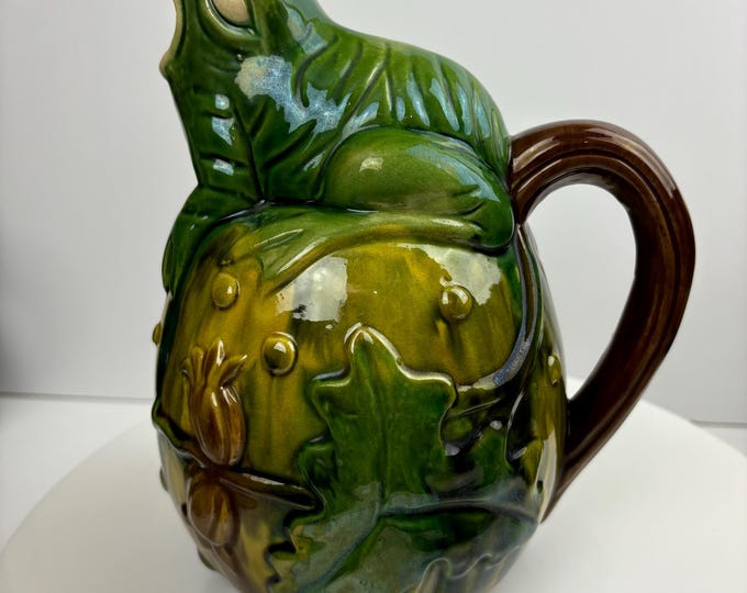 A Highly Decorative Majolica Jug Formed From a Frog on a Gourd, With ...