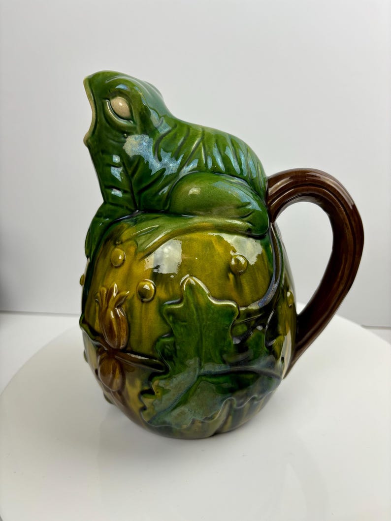 A Highly Decorative Majolica Jug Formed From a Frog on a Gourd, With ...