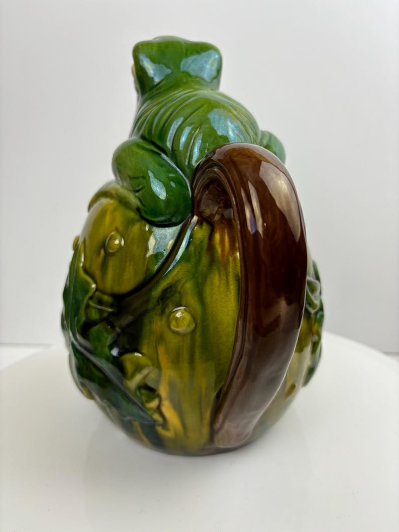 A Highly Decorative Majolica Jug Formed From a Frog on a Gourd, With ...