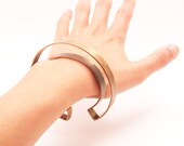 Items similar to negative space cuff - oxidized bronze on Etsy