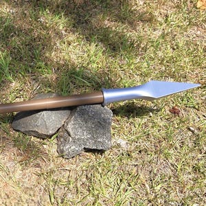 retractable spear head