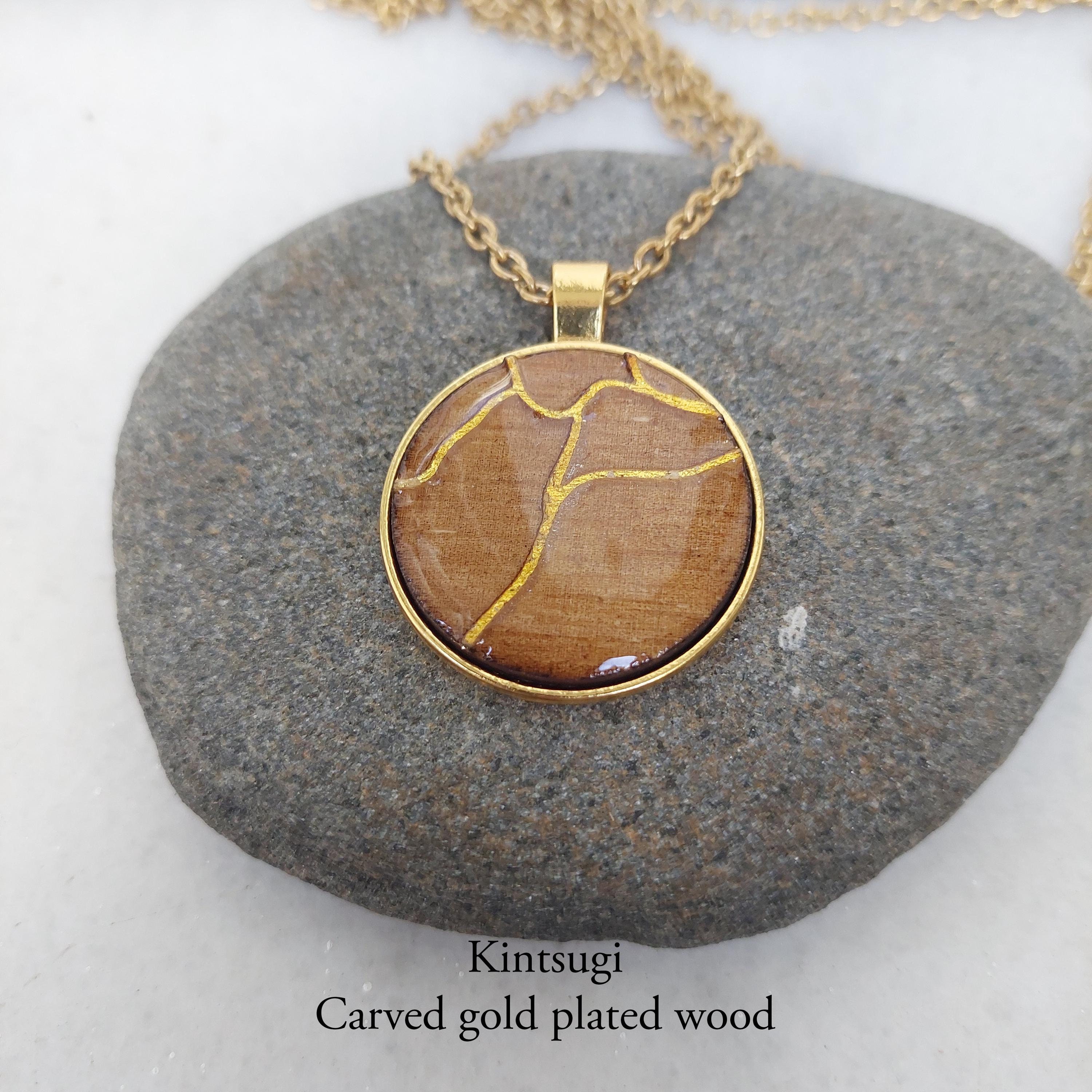 Kintsugi-inspired Pendant: Hand-carved Gold-leaf Wooden Design in a ...