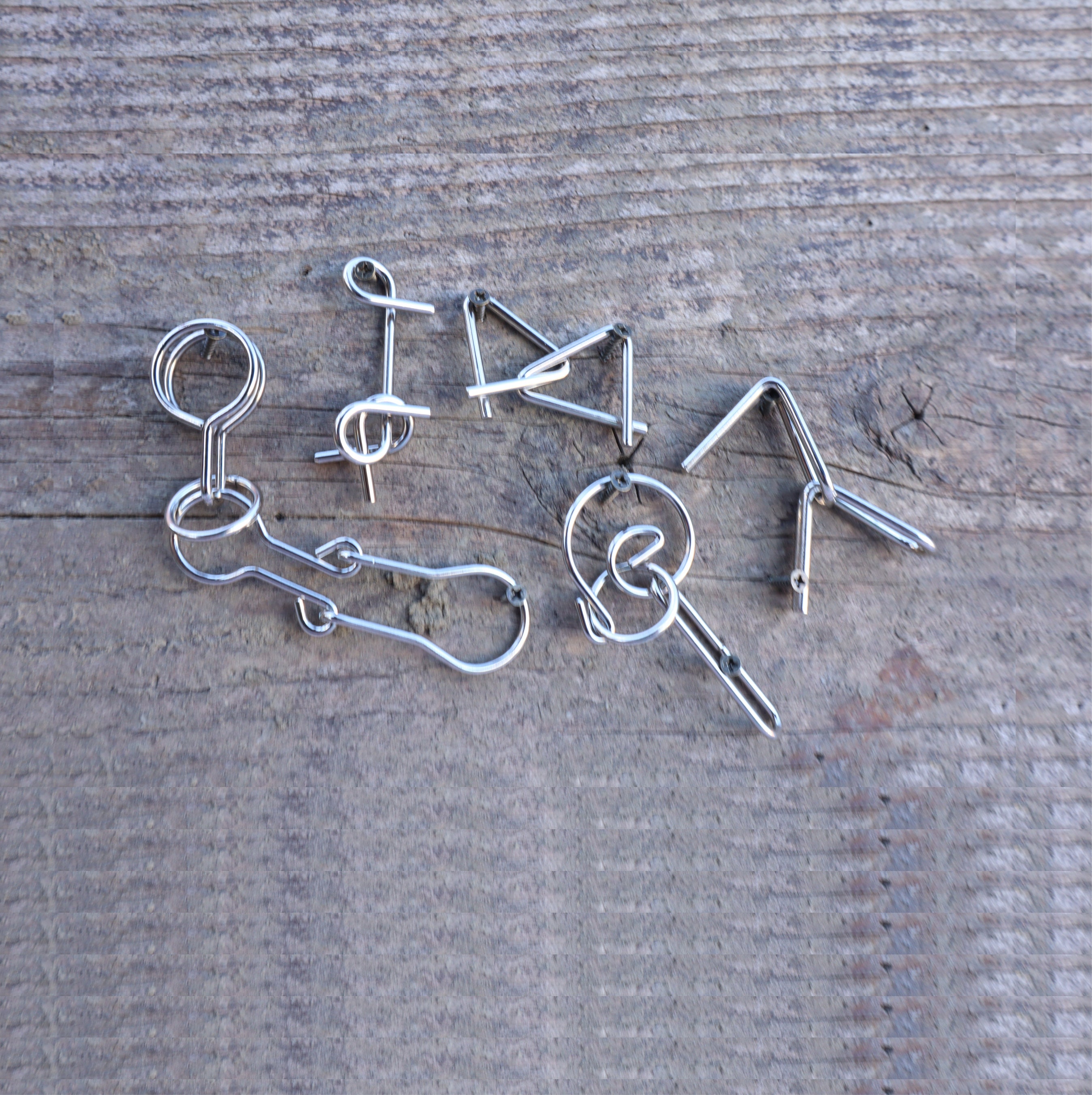 Hanayama Wire Puzzles Blue Set, Brain Teaser, Game, Mechanical Puzzle ...