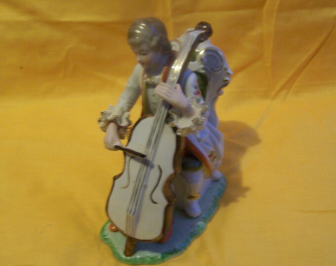 A Victorian Man Playing an Instrument, the Cello, Vintage, 1950's ...