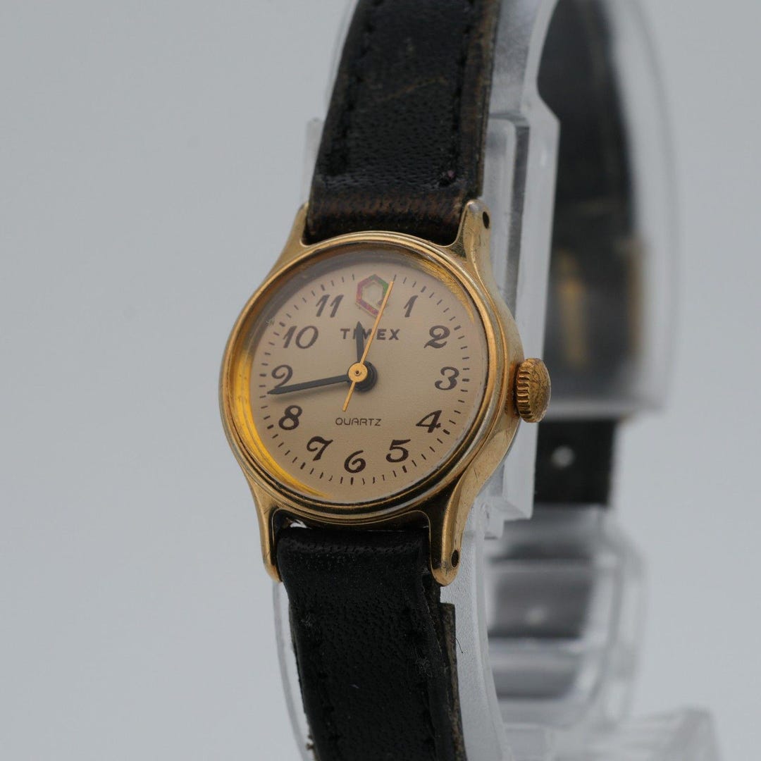 Timex Q Quartz Watch 19mm Gold Tone Cream Dial Black Leather Strap ...
