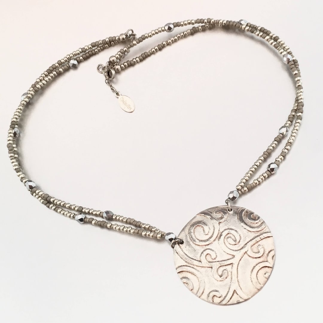Silver Disk With Embossed Swirls Pendant on Double Strand Silver Beaded ...