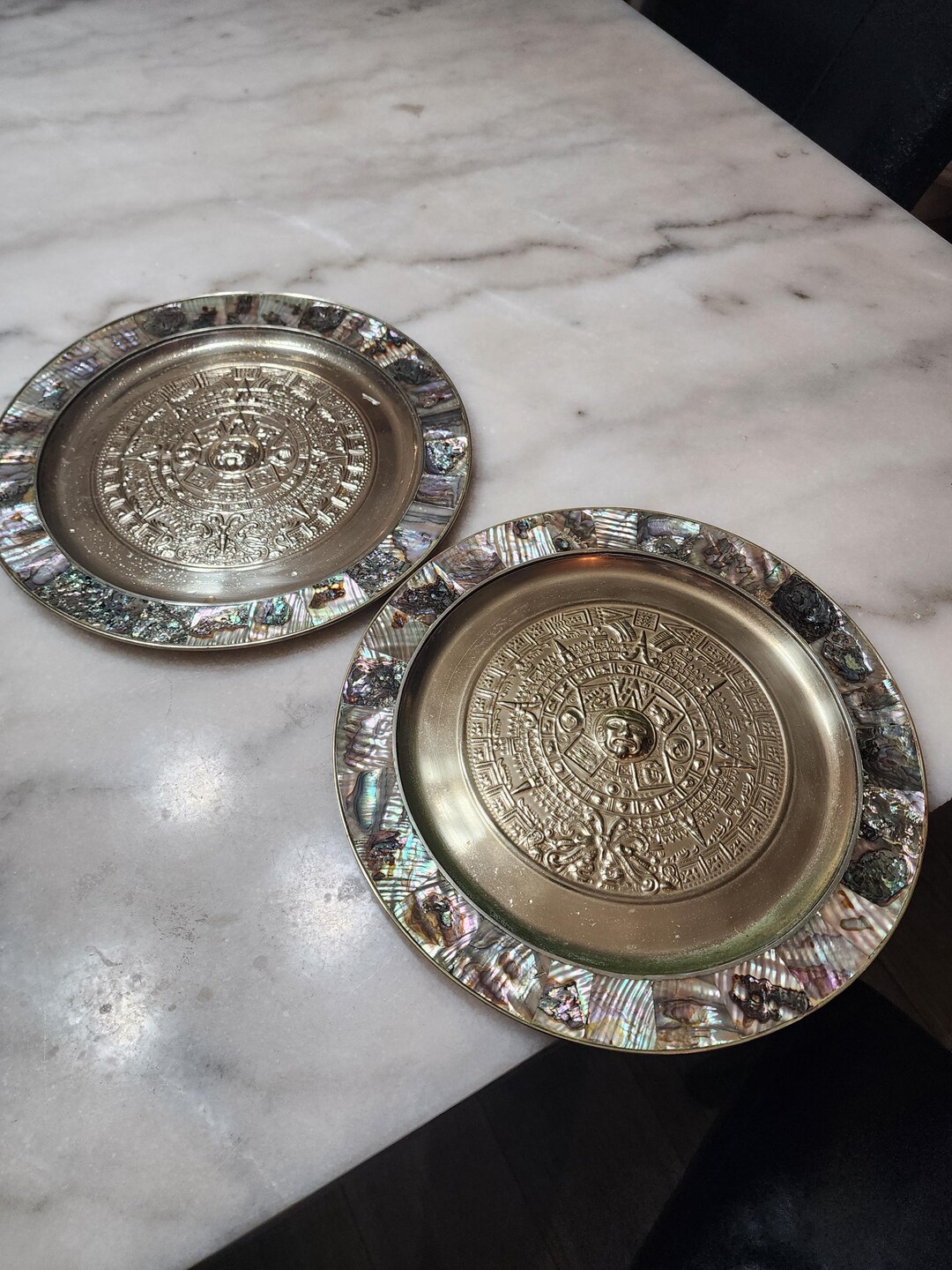 Decorative Plates Featuring the Aztec Calendar Stone Also Known as the ...