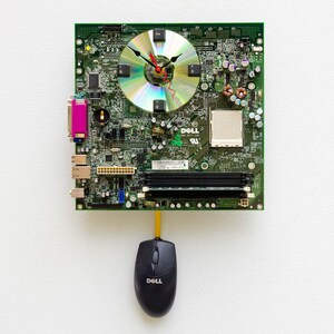 stuff made from stuff clocks made from recycled by pixelthis
