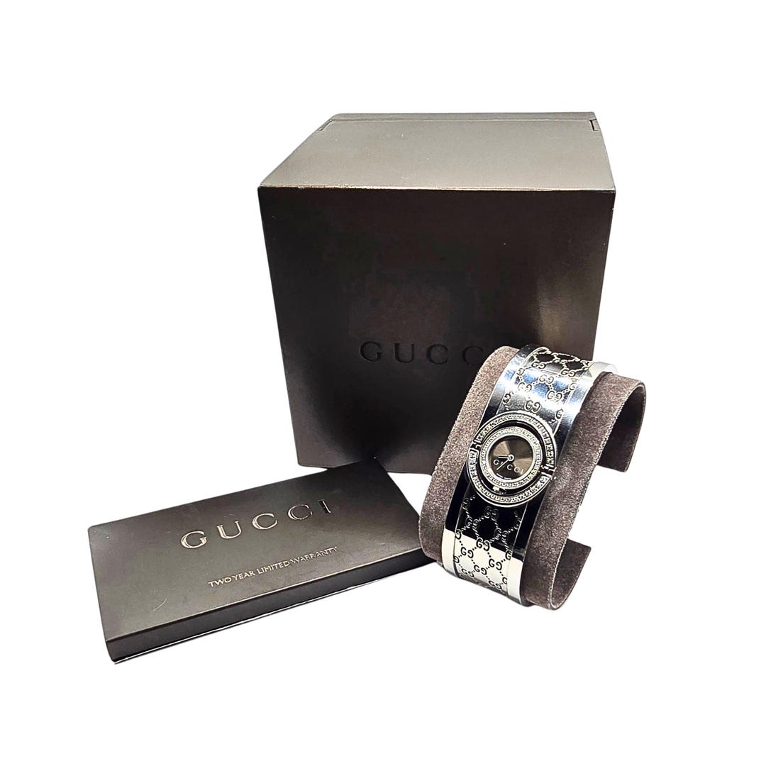 Vintage Gucci Twirl Reversible Bangle Cuff Watch With Diamond Set Bezel ...