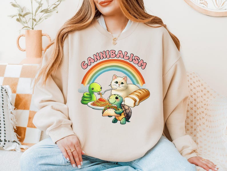 Whimsical CANNIBALISM Design With Playful Cat, Snake, and Turtle ...