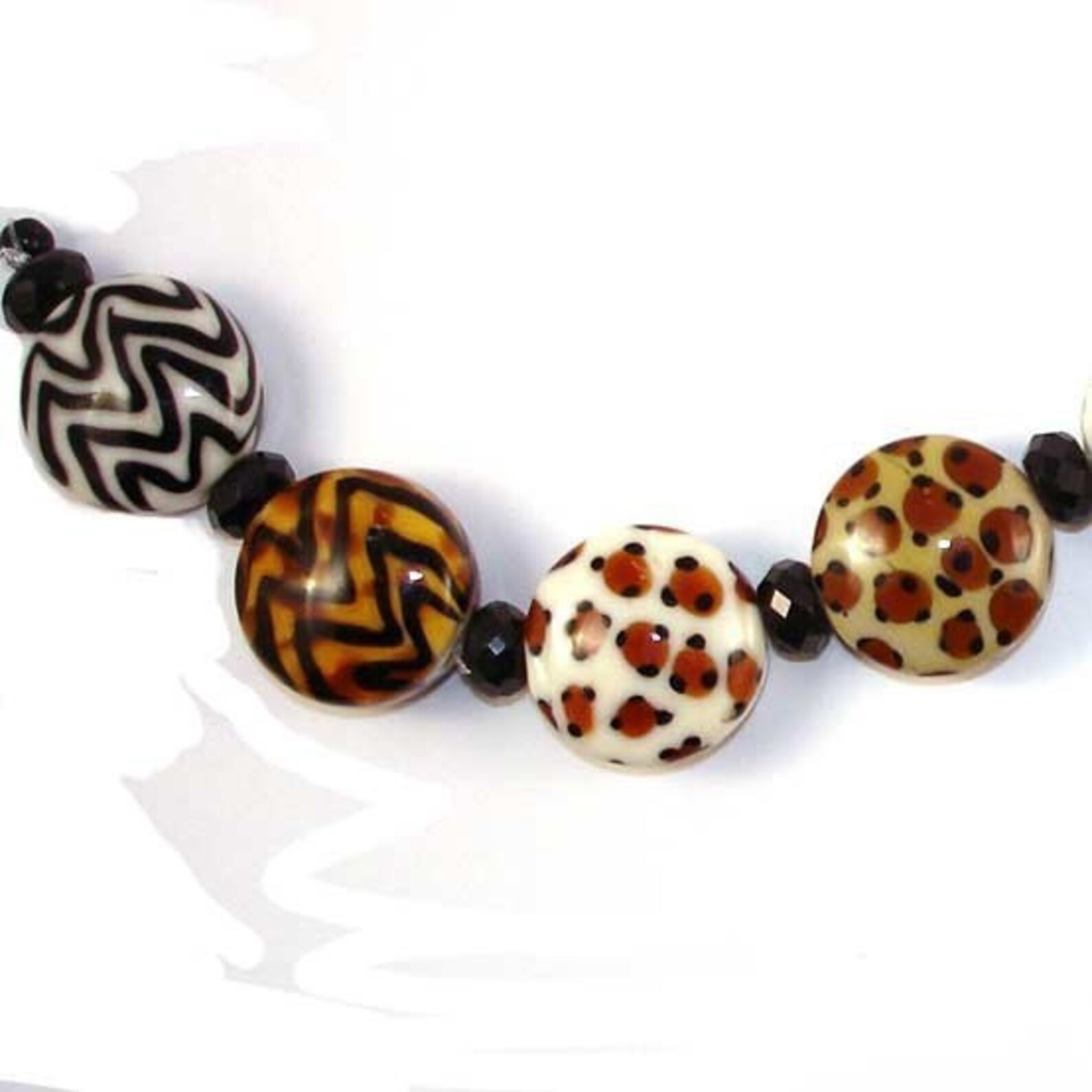 Lampwork Bead Tutorial - Animal Prints by Becky Mason and Diane Woodall ...