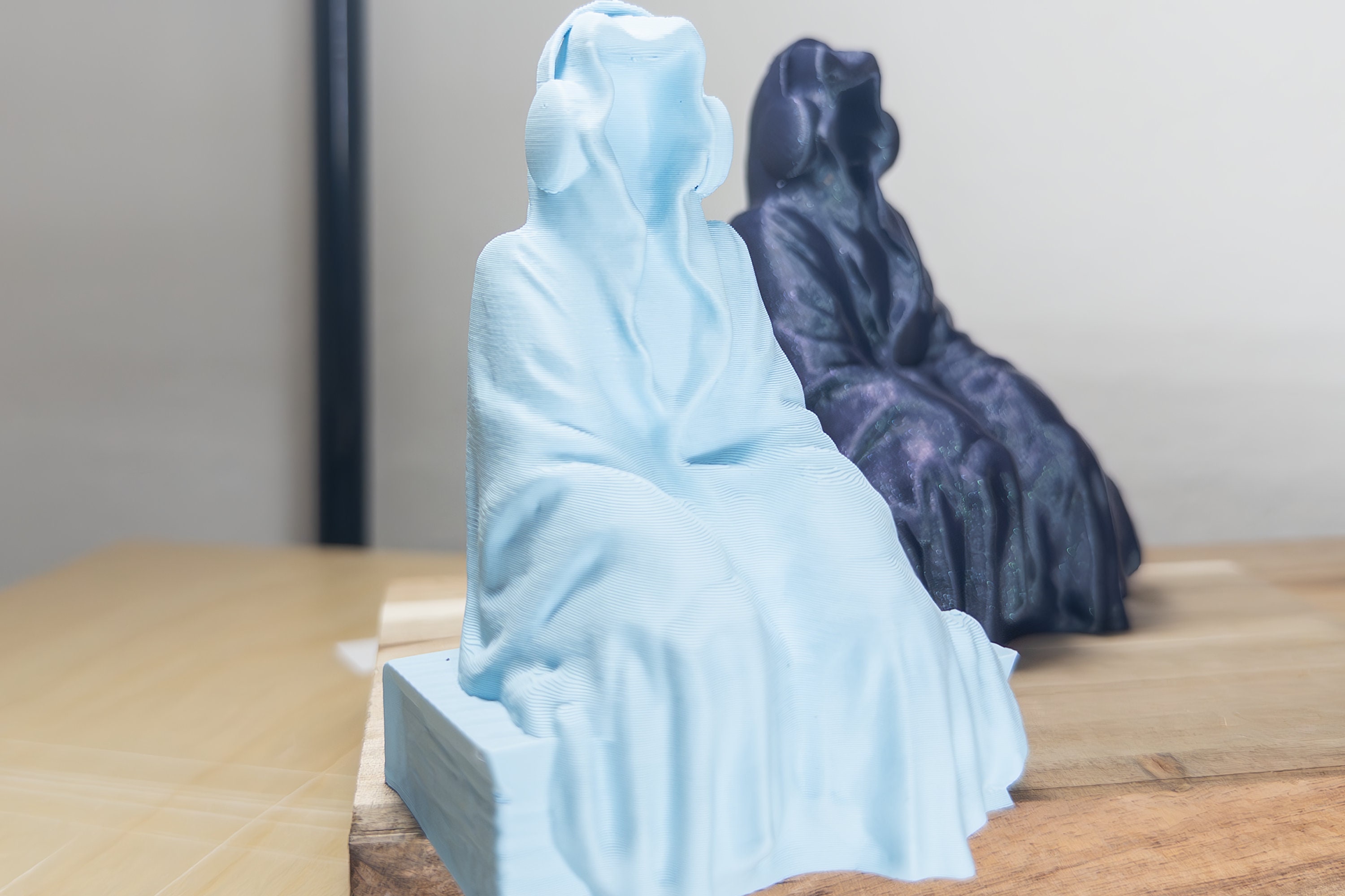 Unique 3d-printed Grim Reaper With Headphones – Sitting on a Book ...