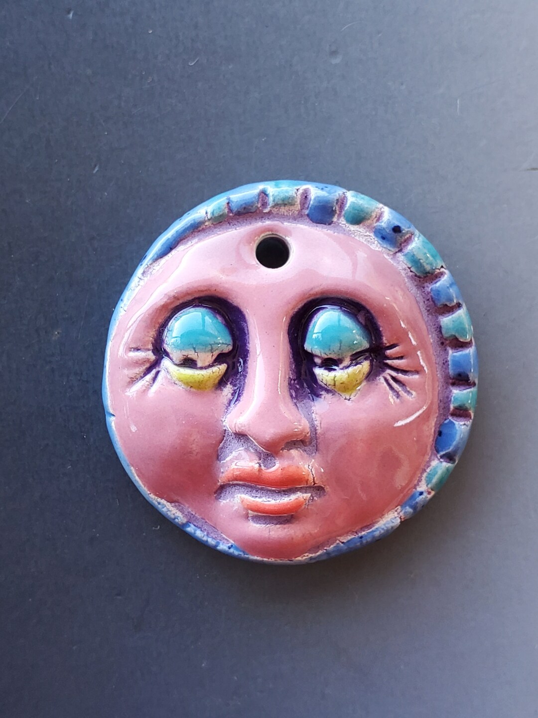 Reversible Ceramic Pink Moon Face Pendant With Purple Faces on the ...