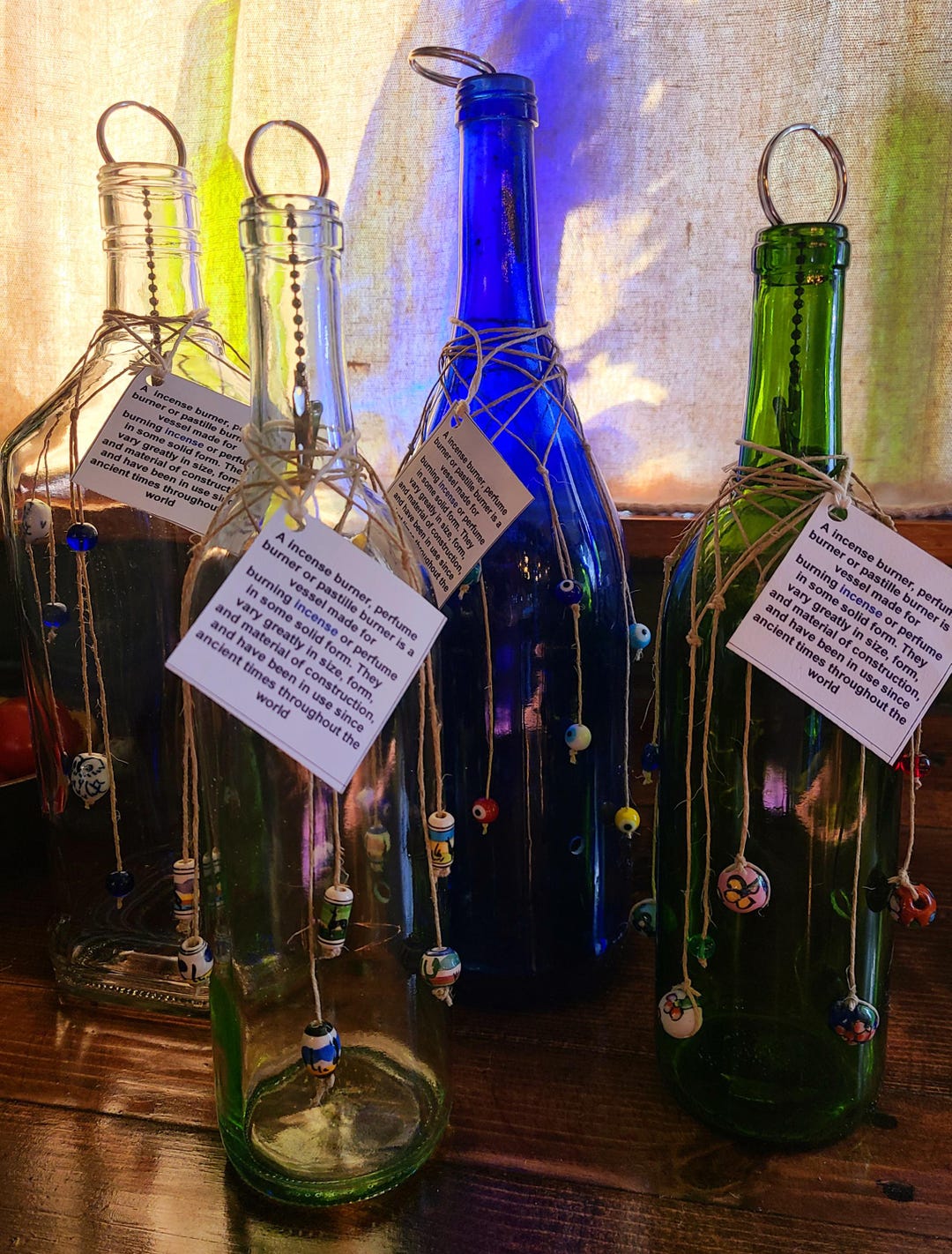 Incense Burners. These Unique Glass Bottles Adorned With Beautiful ...