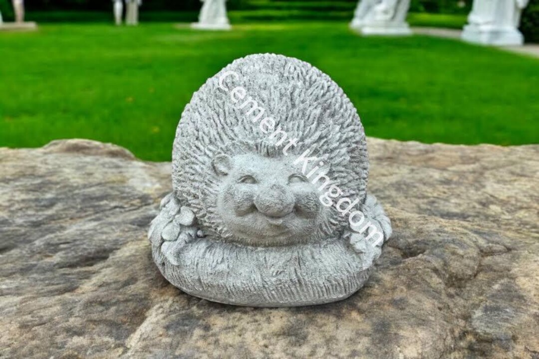 Laying Hedgehog on Base Statue With Flowers Around, Realistic Hedgehog ...