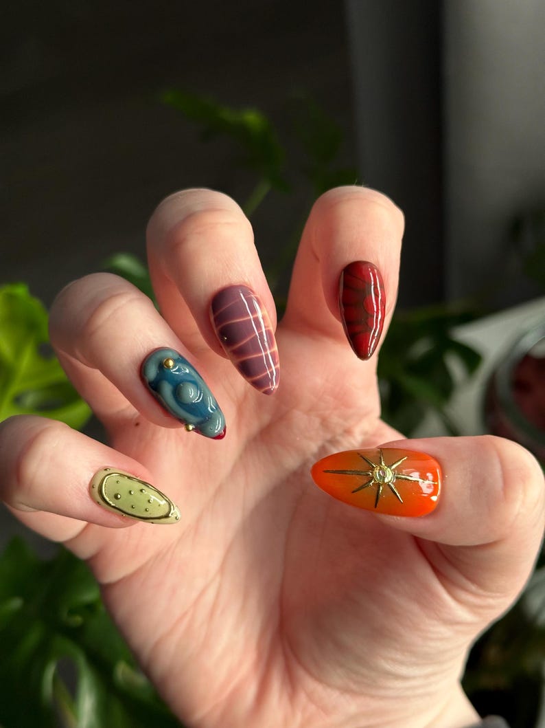 Eccentric Muted Colours Blooming Gel Aura Gold Chrome Gems Almond ...