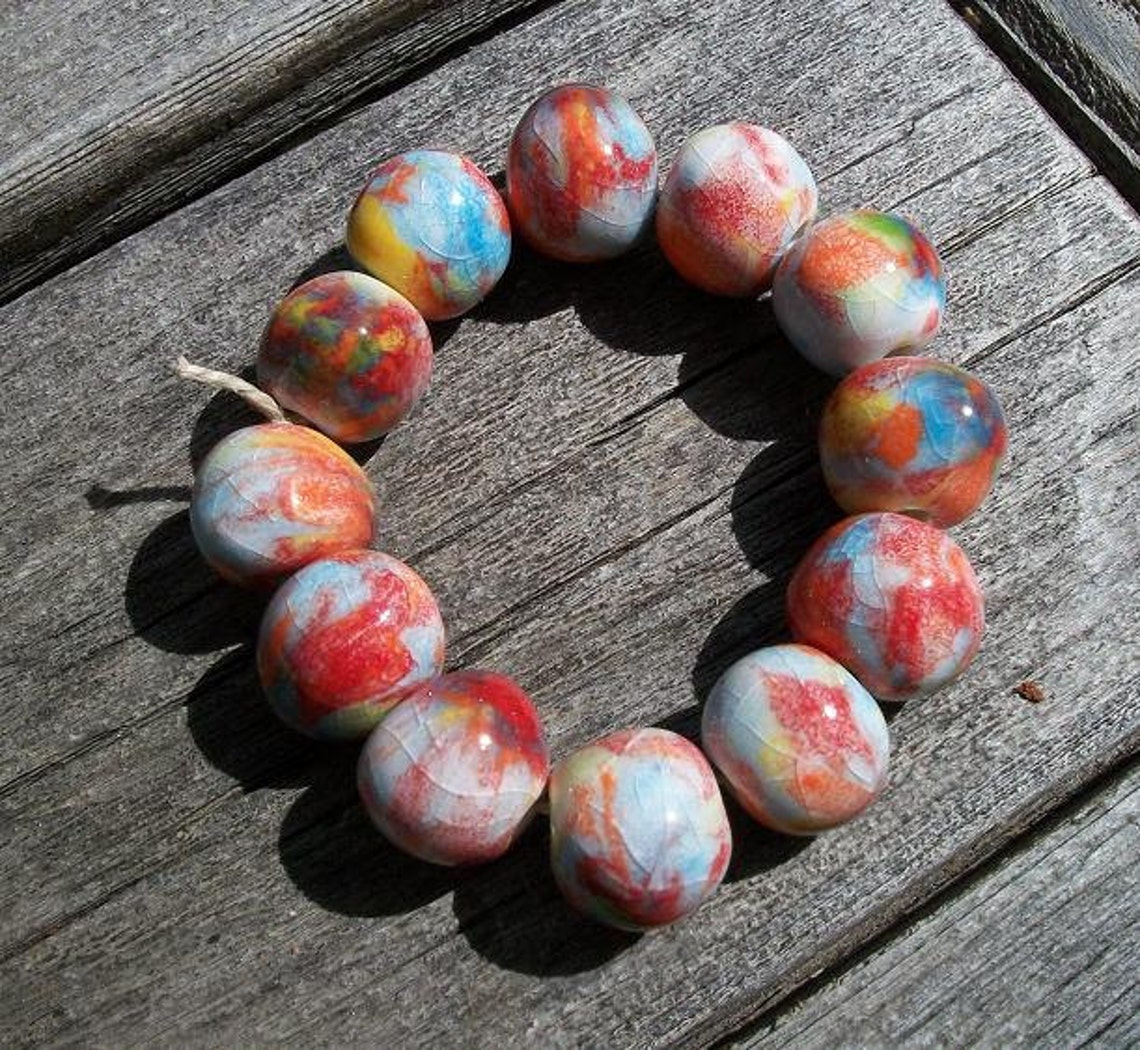 A Strand of 12 Multi Color Ceramic Round Beads - Etsy