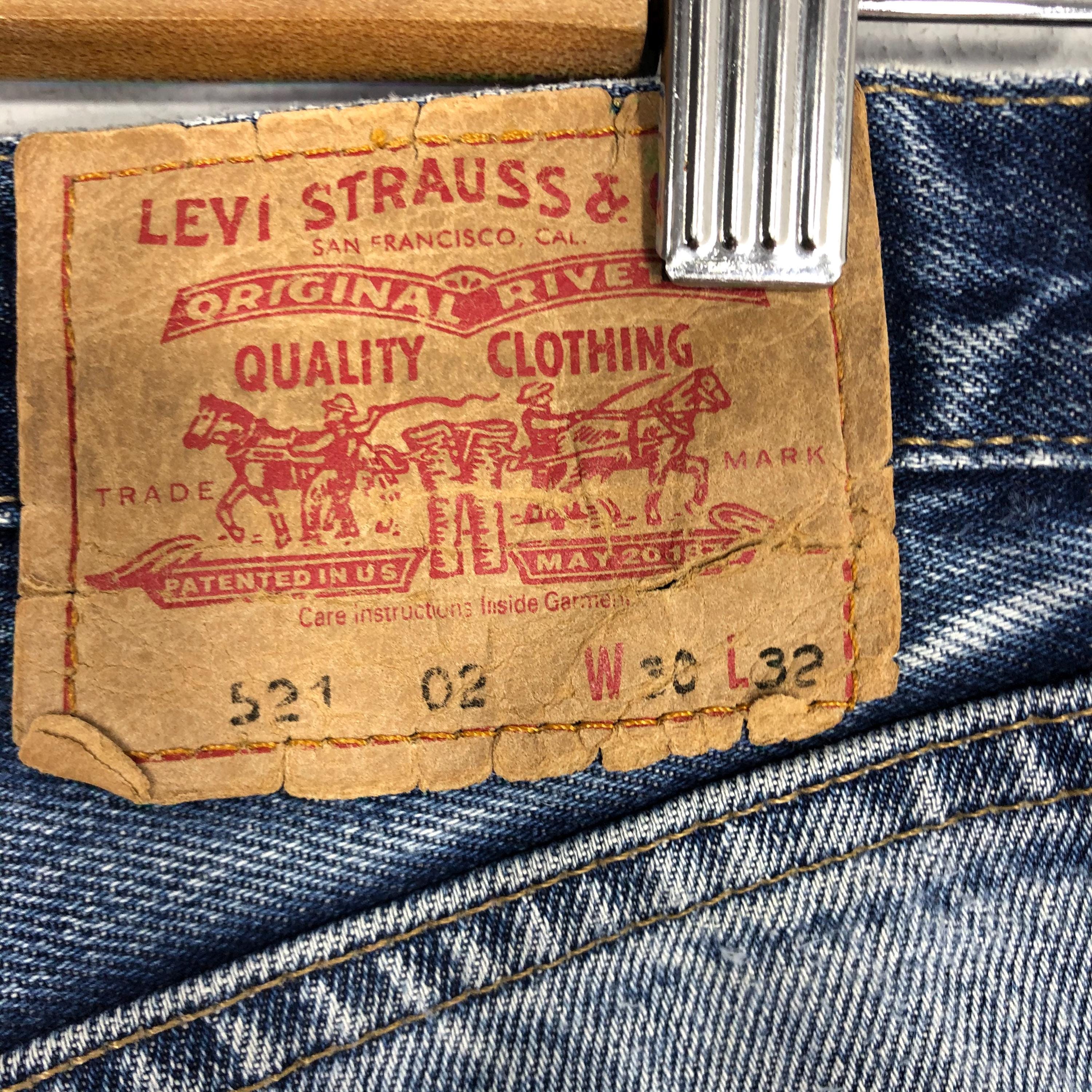 Vintage Levi's 521 Jeans: 90s Faded Stone Wash, Ripped Denim (W30 X 39. ...