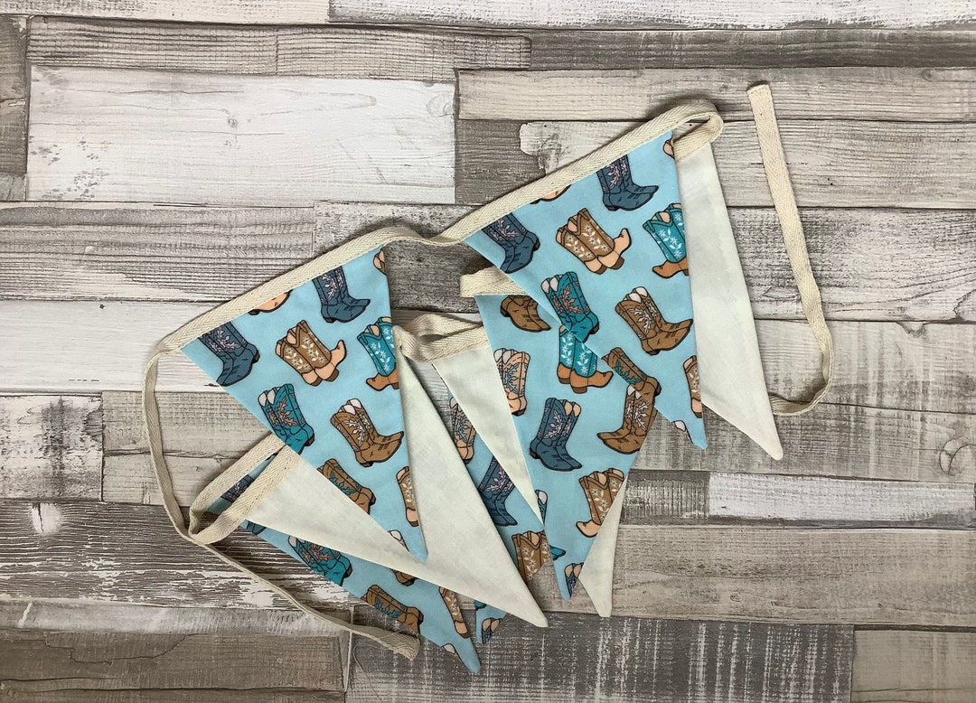 Cowboy Boots in Cream, Turquoise and Tan on a Blue Background. Western ...