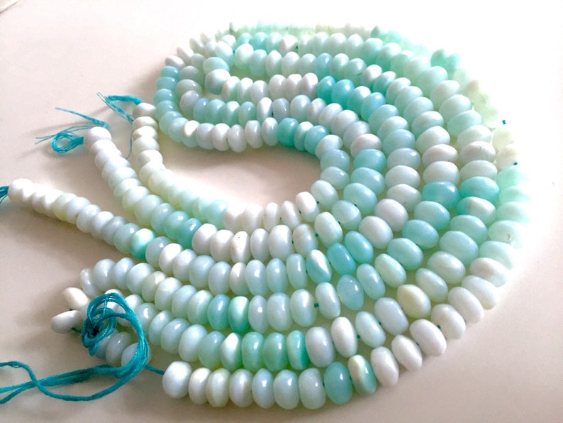 1/2 Strand Lite Smooth Peruvian Opal Roundels 20.00 - Etsy
