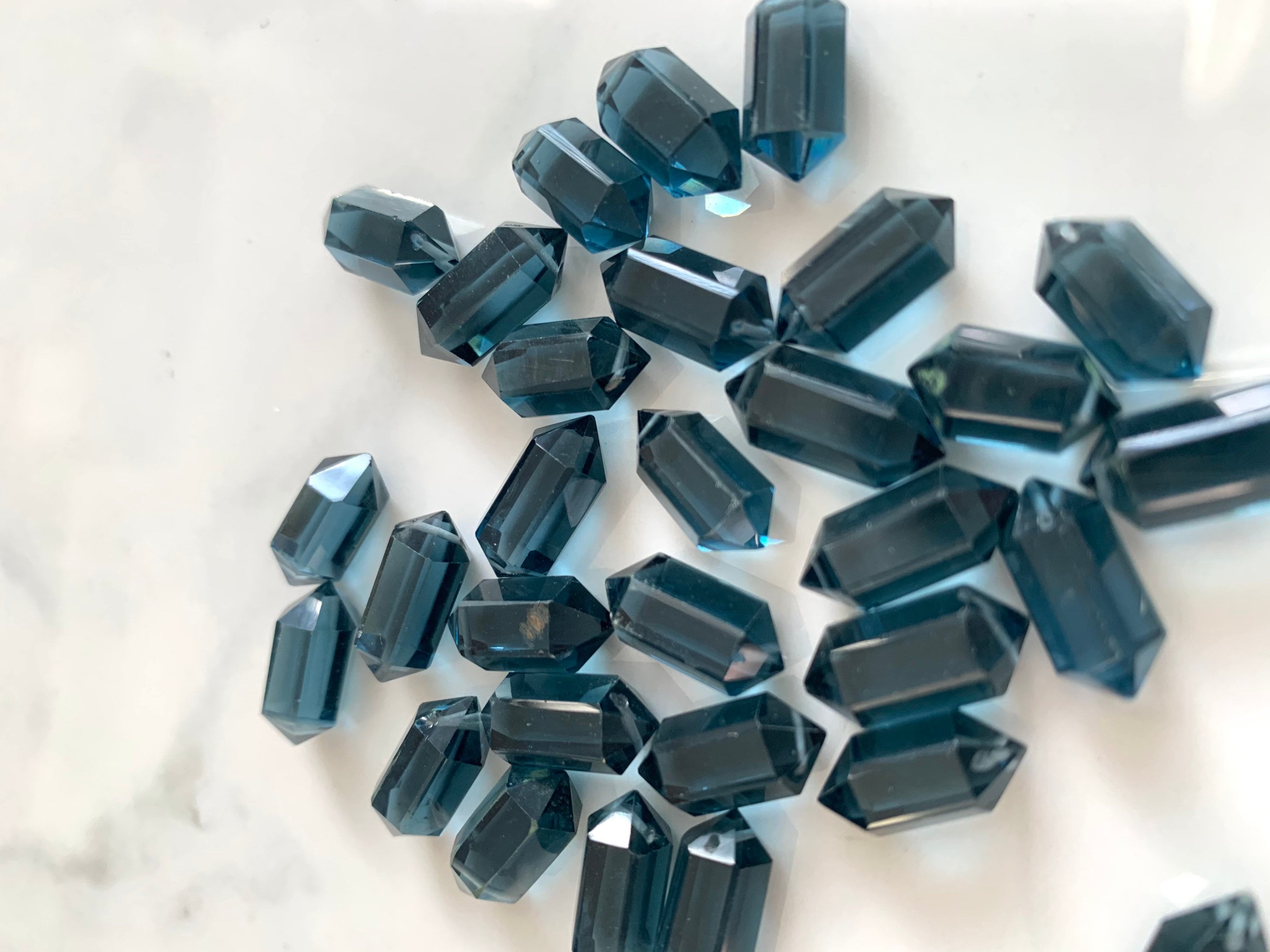 London blue colored bullet shaped beads | Etsy