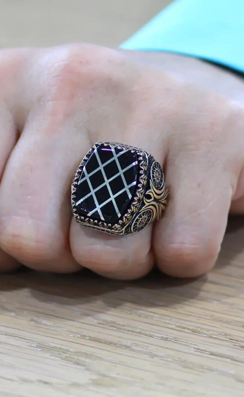 The Ring of Mammon: A Gateway to Infinite Wealth - Etsy