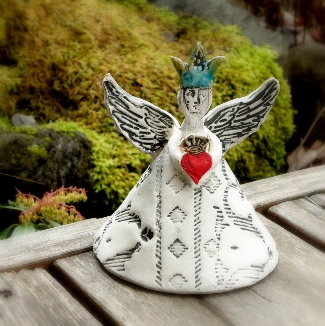 Custom Angel Holding Sacred Heart - Etsy