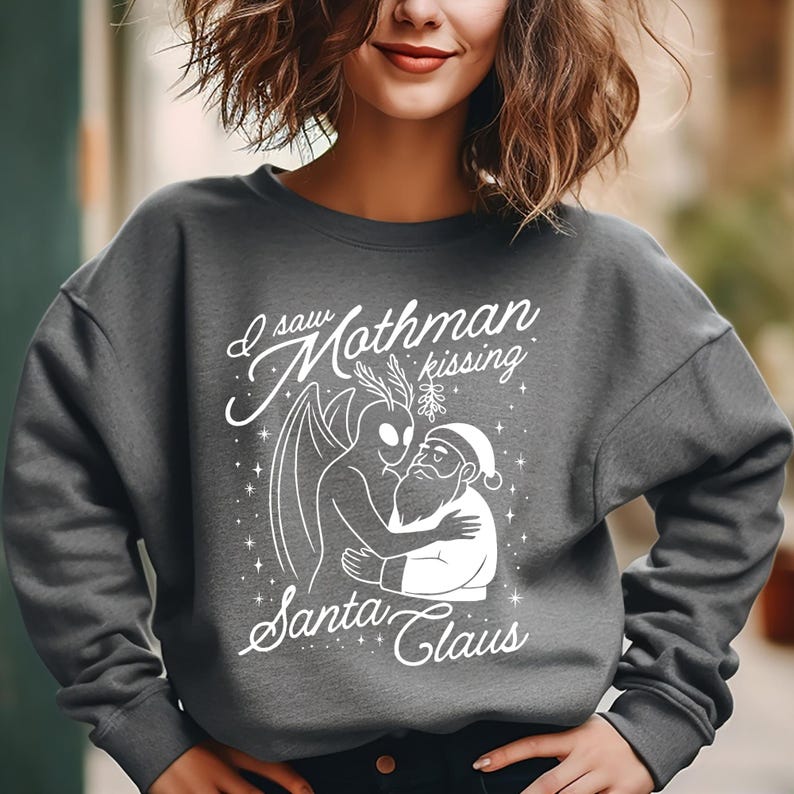 I Saw Mothman Kissing Santa Claus Sweatshirt: Funny Christmas Cryptid ...