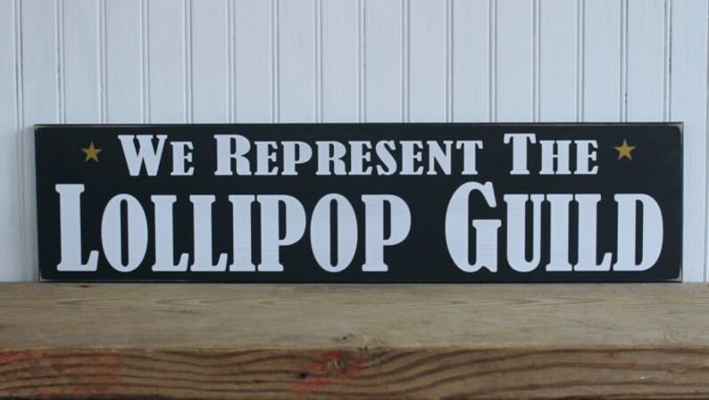 Lollipop Guild Sign We Represent the Lollipop Guild wizard - Etsy