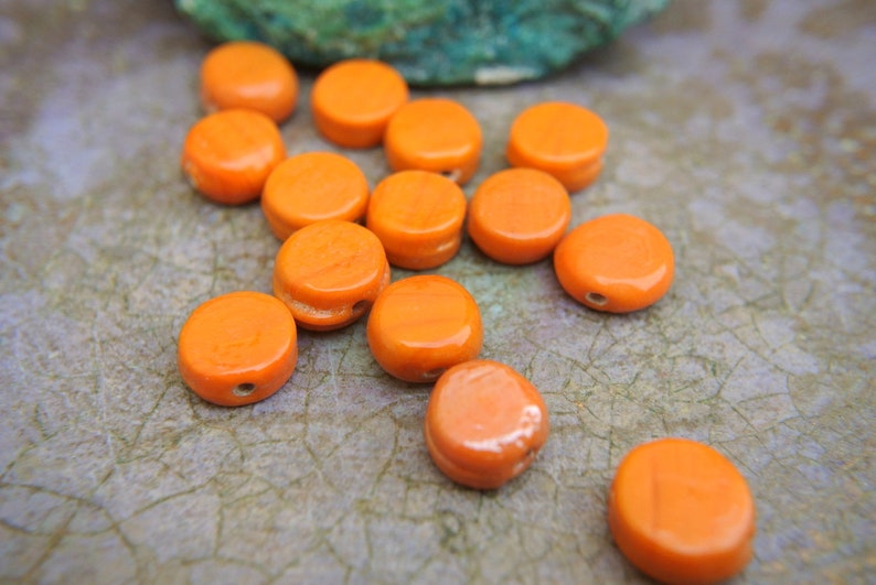 12 Vintage glass beads beautiful orange coin shape 10mmx5mm | Etsy