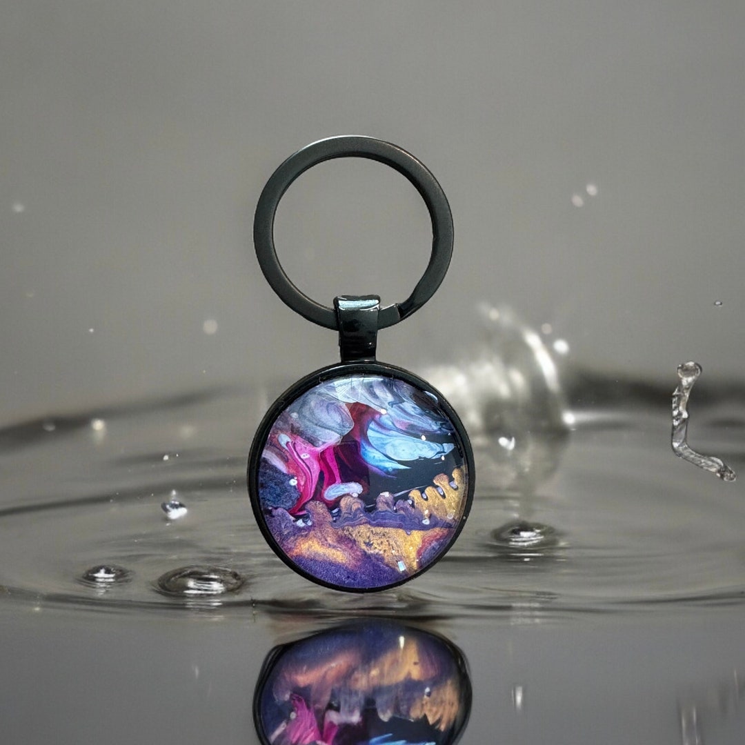 Colorful Swirl Key Ring Shades of Blue, Pink, Gold, Purple Black Bezel ...