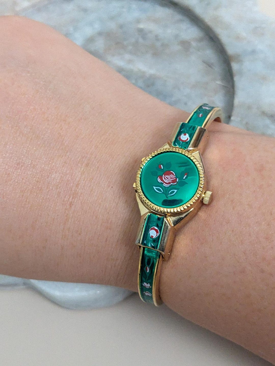 Vintage Belami Gold Tone Peek a Boo Watch Green Backdrop With Flower ...