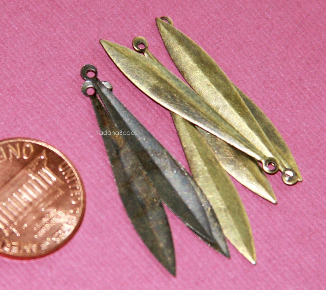 50 Pcs Antiqued Brass Paddle Drops 34x6mm - Etsy