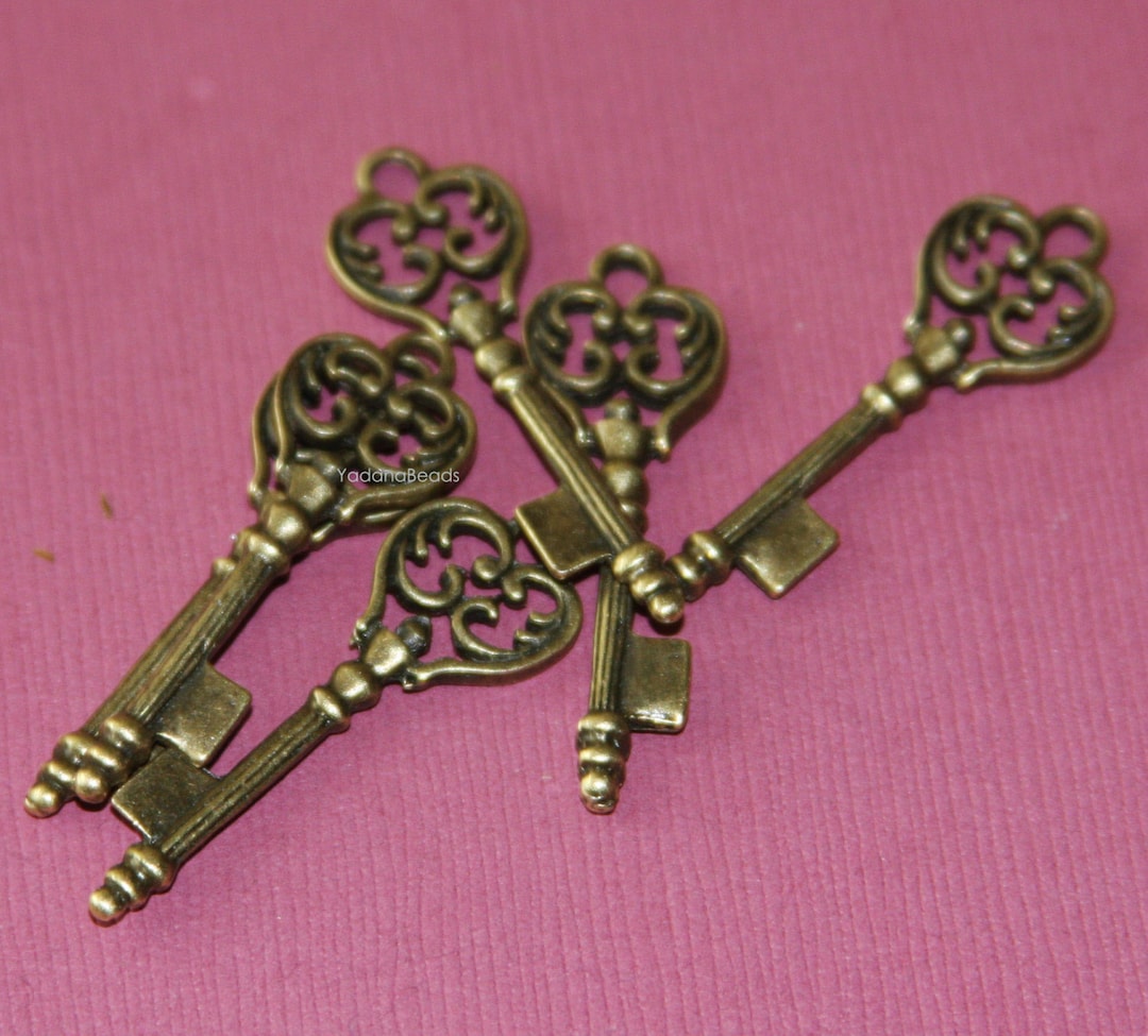 Bulk 60 Pcs Antiqued Brass Finished Key Charm 36x11mm - Etsy