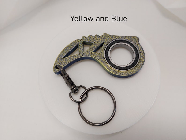 Keyrambit Finger Spinner, Fidget, Stress Relief , Multiple Colours ...