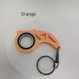 Keyrambit Finger Spinner, Fidget, Stress Relief , Multiple Colours ...