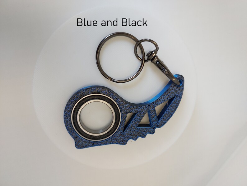 Keyrambit Finger Spinner, Fidget, Stress Relief , Multiple Colours ...