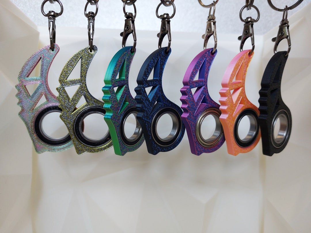 Keyrambit Finger Spinner, Fidget, Stress Relief , Multiple Colours ...