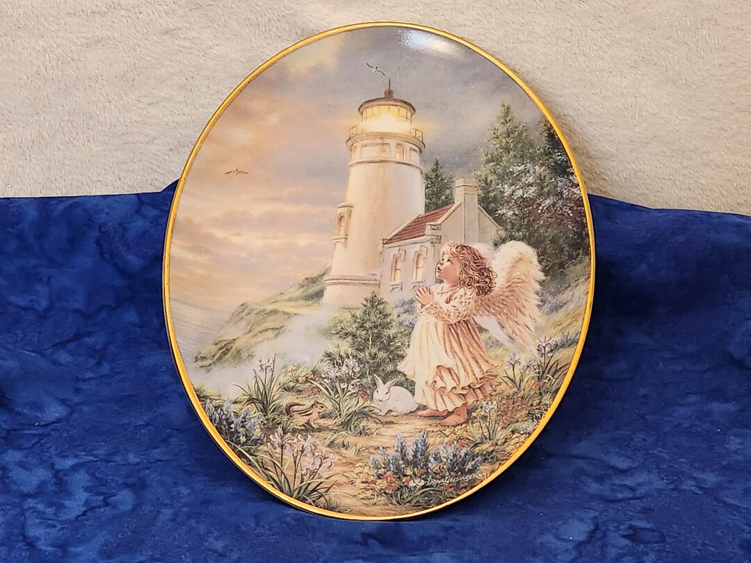 Lighthouse and Angel Oval Plates Bradford Exchange A Little Hop Lights ...