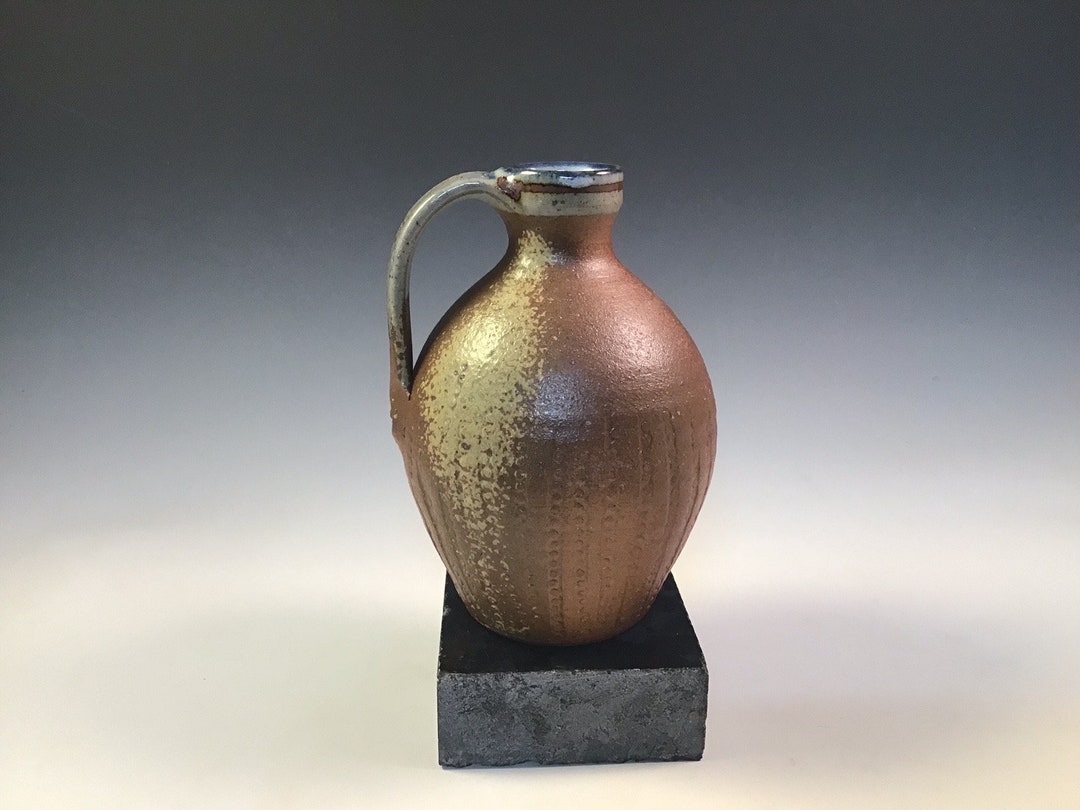 Simon Leach Signature Strap Handle Bottle - Etsy