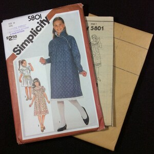 Simplicity Girls' Loose-fitting Asymmetrical Pullover Dress in Two ...