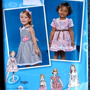 Simplicity 2460 Complete Uncut Factory Folds Project Runway Child's Knee Length Fit and Flare ...